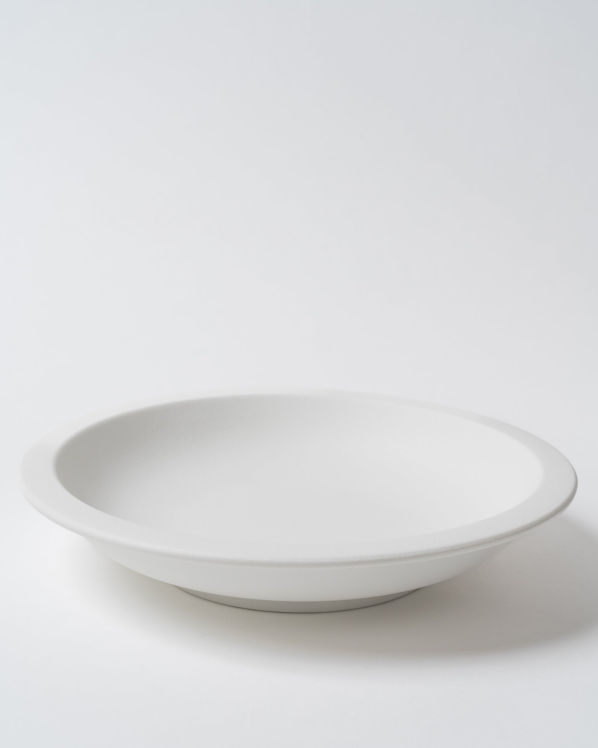 10" White Porcelain Deep Plate – Bun and Pillow
